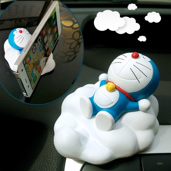 Robot cat Dora A Meng Meng sleeps on the mobile phone holder. | Wish