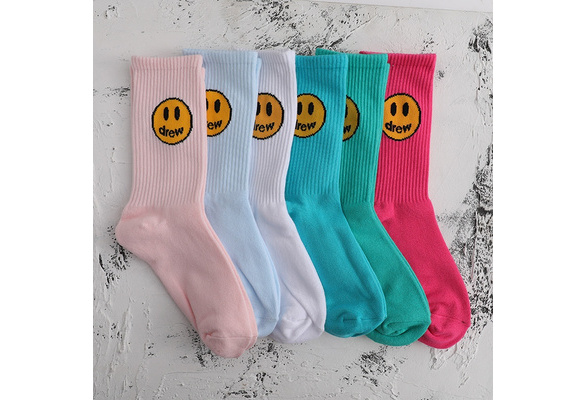 Men and women drew house Justin Bieber the same five color smiling face hip hop mid tube sports wild street socks Wish