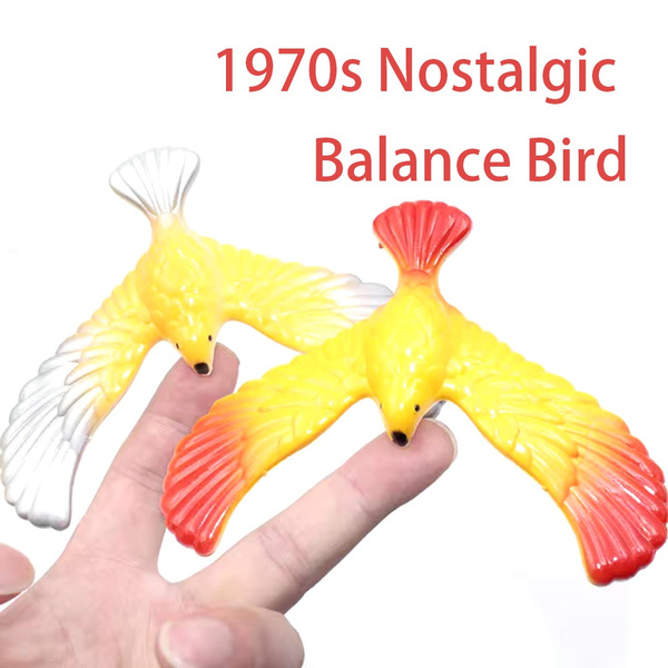 Nostalgic classic tumbler balanced bird tabletop display playing with ...